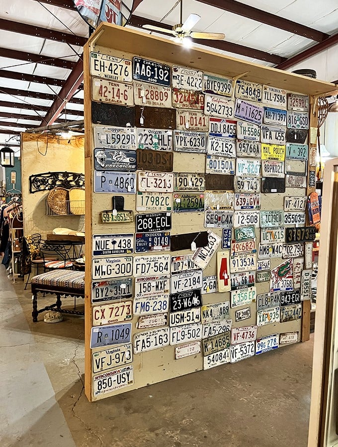 License plate paradise! This ingenious display showcases America's road history&mdash;each plate a tiny time capsule from someone's cross-country adventures.