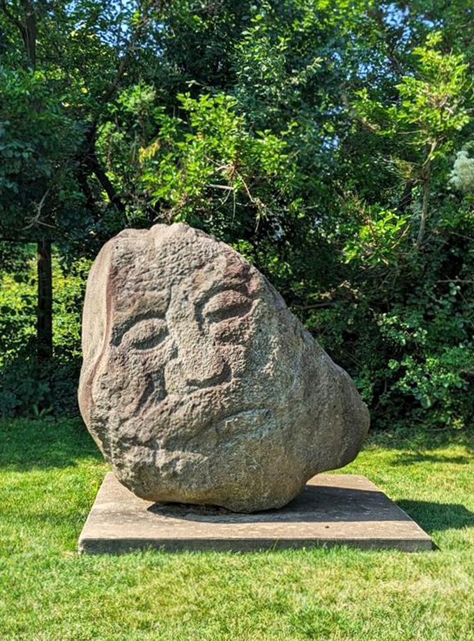 Ancient meets modern in this striking stone face. It's as if the earth itself decided to join the conversation about art.