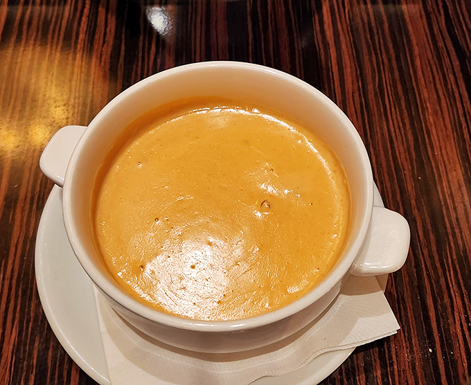 This lobster bisque isn't just soup&mdash;it's a velvety ocean of flavor that makes you want to high-five the chef and request seconds.