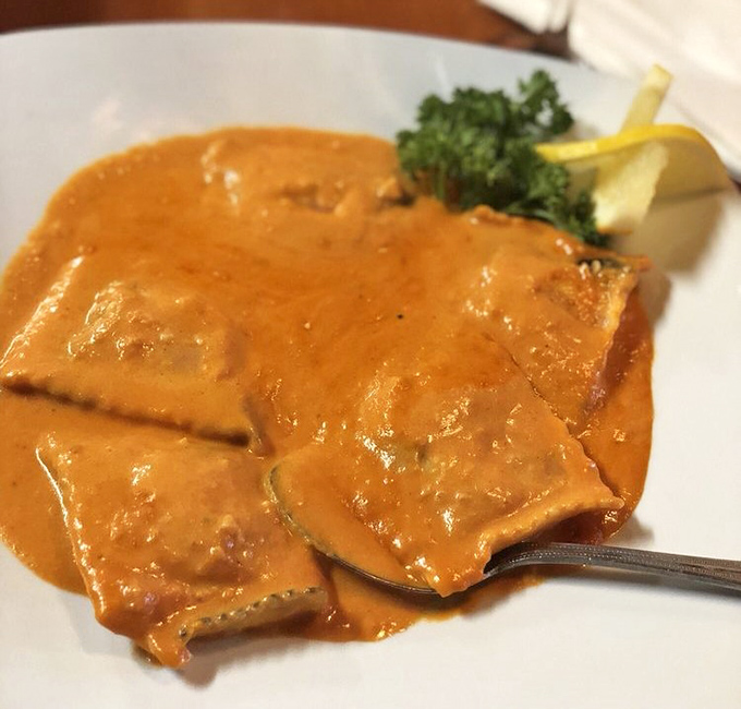 The star of the show: lobster ravioli bathed in vodka rose sauce. Your fork doesn't stand a chance against this pillowy pasta perfection.