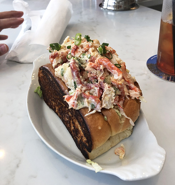 The star of the show: a lobster roll bursting with sweet, tender chunks. That toasty, buttery bun cradles seafood so fresh you'll forget you're in Ohio.