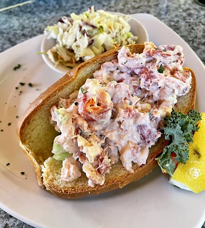 Behold the lobster roll that'll make you question every sandwich you've ever called "good" &ndash; pure perfection on bread.