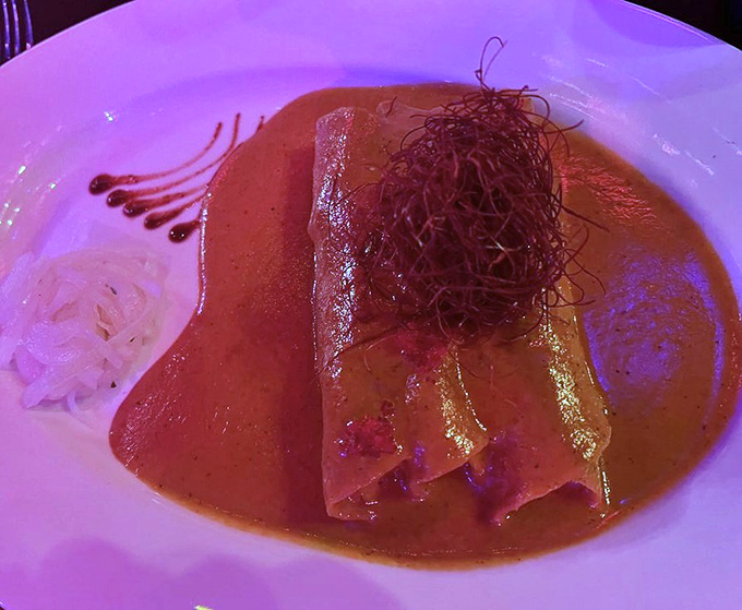 Enchiladas elevated to art form&mdash;this saucy masterpiece isn't just dinner, it's what your taste buds have been dreaming about their entire lives.