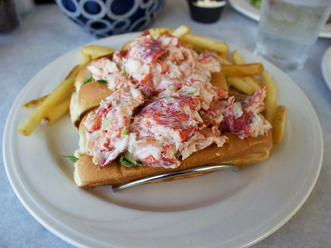 The star of the show: a lobster roll so generously packed with sweet meat, it's practically performing a magic trick by staying in its bun.