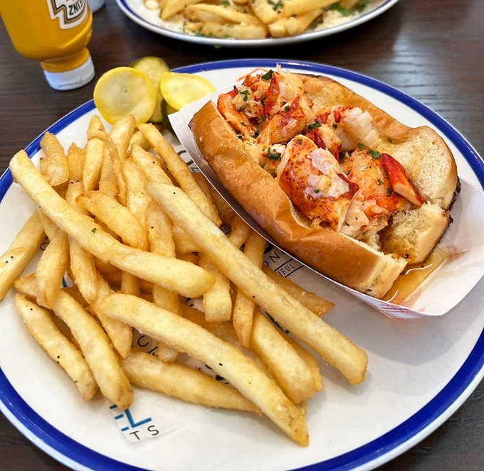 This lobster roll isn't just a sandwich&mdash;it's summer vacation on a plate. Buttery, toasted perfection cradling sweet lobster meat that tastes like the Atlantic's finest offering.