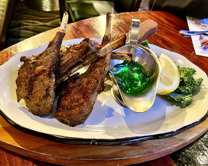 These lollipop lamb chops aren't just meat on sticks&mdash;they're primal satisfaction with a touch of elegance. The mint jelly adds that perfect sweet counterpoint to the savory richness.