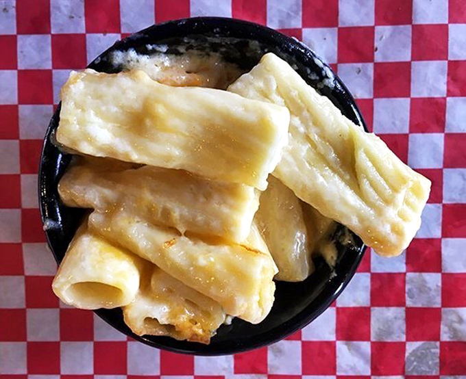 Behold the star attraction &ndash; mac and cheese that achieves the seemingly impossible balance between creamy and stringy. This isn't a side dish; it's the main event.