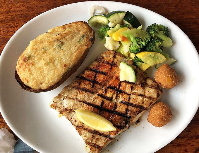 Perfectly grilled mahi mahi with grill marks that deserve their own Instagram account. The twice-baked potato and fresh vegetables aren't sidekicks&mdash;they're worthy co-stars. 