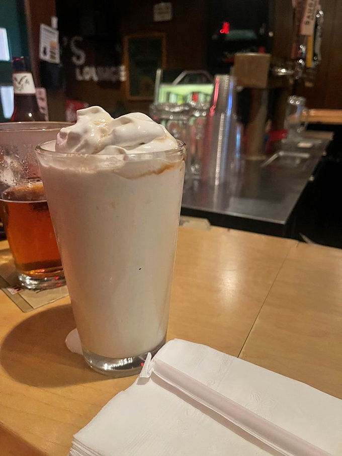 A hand-scooped milkshake that's so thick, your straw stands at attention. This creamy masterpiece isn't just dessert&mdash;it's therapy in a glass. 