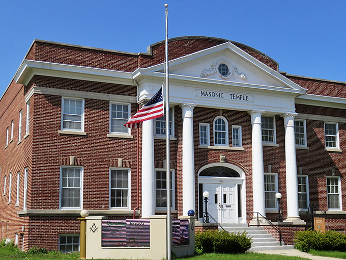 The Masonic Temple brings a touch of classical grandeur to Main Street. That American flag isn't just decoration – it's a reminder of the community pride that keeps Port Washington thriving.