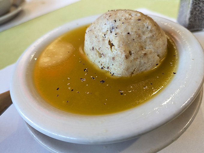 The matzo ball soup at Jack's floats like a cloud in golden broth &ndash; chicken soup for the soul that actually deserves the title.