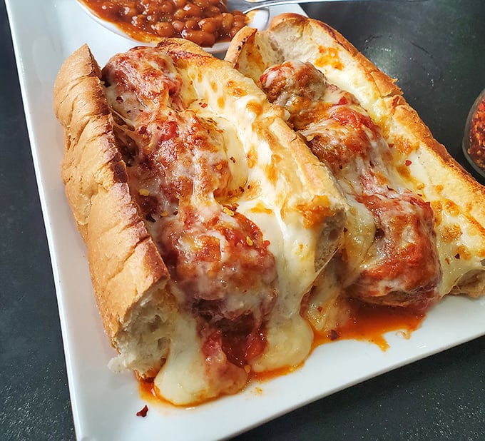 Behold the legendary meatball sub in all its saucy, cheesy glory. Those aren't just meatballs&mdash;they're edible works of art.