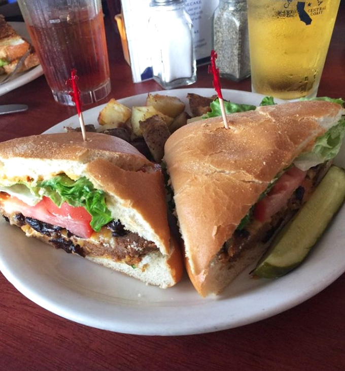 The meatloaf sandwich arrives like a warm hug from your favorite aunt who actually knows how to cook.