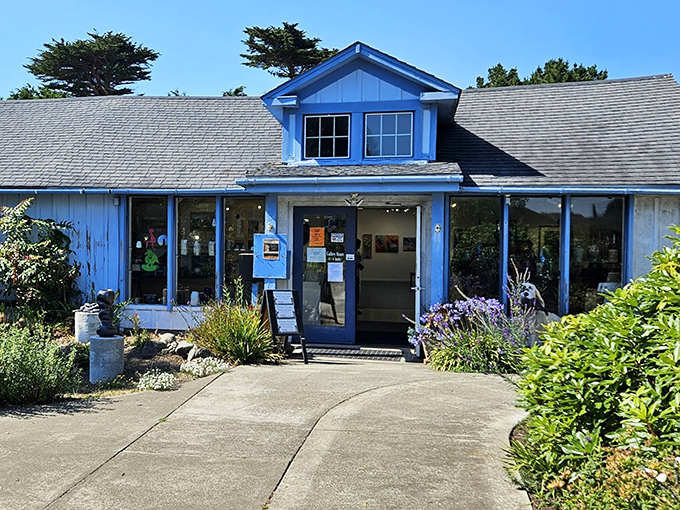 The blue building isn't just a structure; it's Mendocino's artistic heartbeat. Where creativity flows as steadily as the nearby ocean currents.