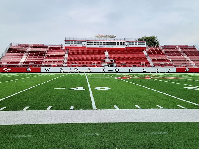 Friday night lights shine brightest at Wapakoneta's pristine stadium. The red seats await faithful fans who've been cheering on the Redskins for generations.