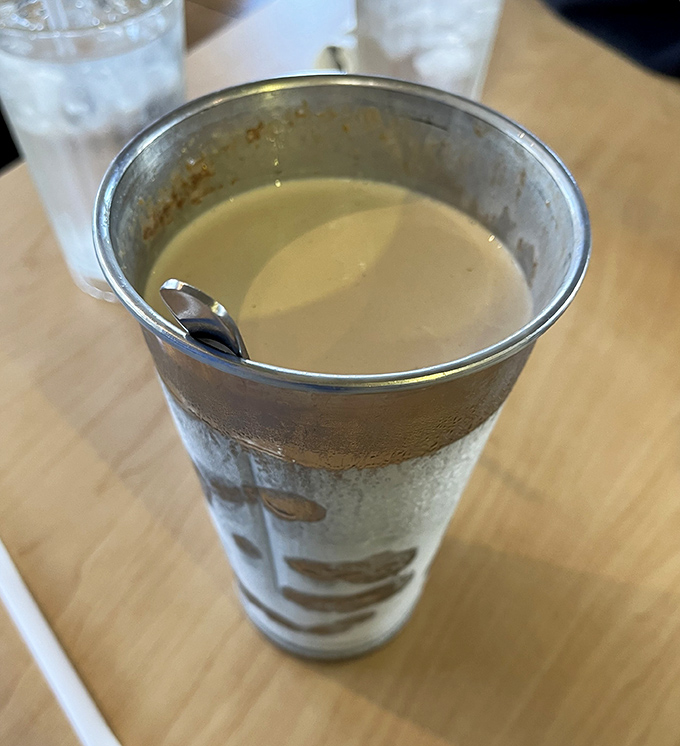This isn't just a milkshake&mdash;it's a frosty time machine to when desserts were honest and straightforward. The metal mixing cup is the bonus round nobody asked for but everyone appreciates.