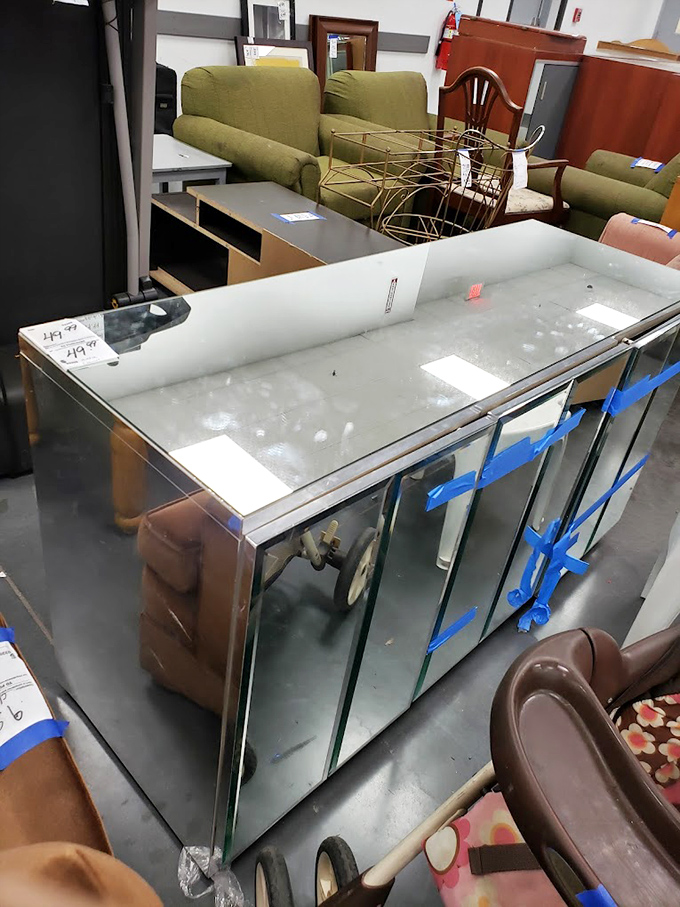 Mid-century modern or retro chic? This glass display case could showcase collectibles in your home for less than a fancy dinner out.