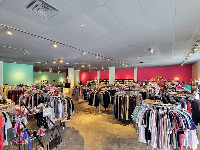 Clothing racks stretch toward the horizon in this bargain hunter's dreamscape. The track lighting casts a flattering glow that makes everything look runway-ready.