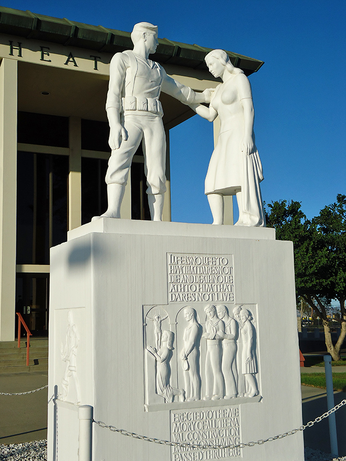 This striking monument captures a moment of connection, frozen in white marble. The sculptural tribute stands as a silent reminder of service and sacrifice.