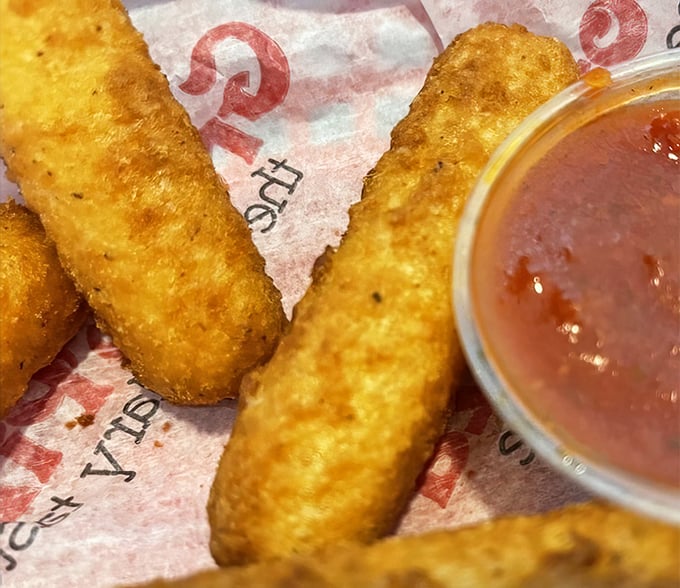 The legendary mozzarella sticks in their golden-brown glory. That perfect cheese pull is worth the trip to Wilkes-Barre Township alone.