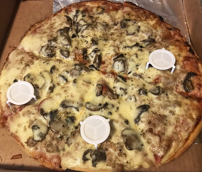 Mushrooms that actually taste like mushrooms, swimming in cheese that stretches like a mozzarella marathon.