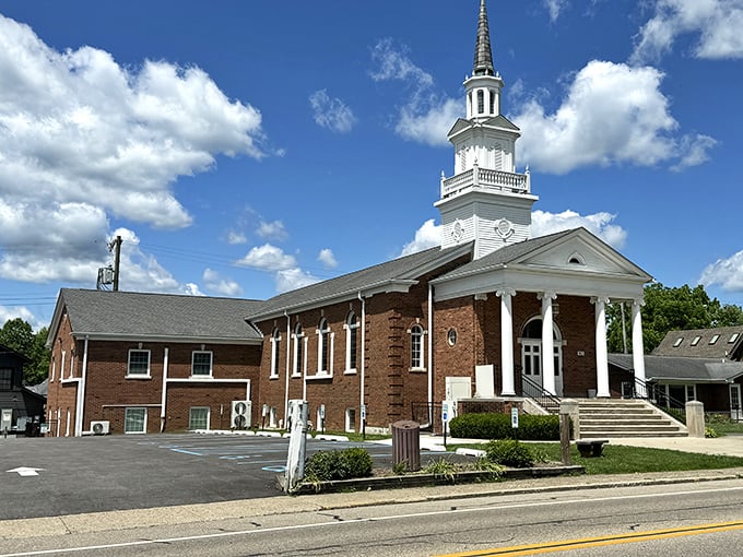 Nashville Christian Church's classic white steeple reaches skyward, a timeless beacon in this artistic community.