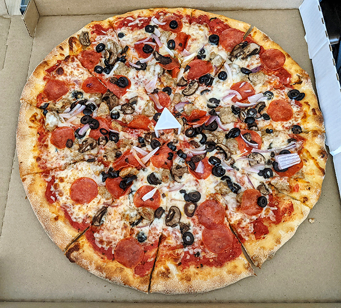 Pizza perfection doesn't need fancy words &ndash; just look at those crispy-edged pepperoni cups creating little pools of flavor heaven. This is why stretchy pants were invented.