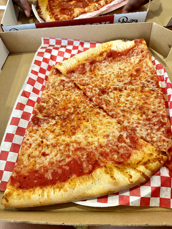 This isn't just a slice&mdash;it's edible New York real estate. The perfect fold, the ideal cheese-to-sauce ratio, and not a tourist in sight.