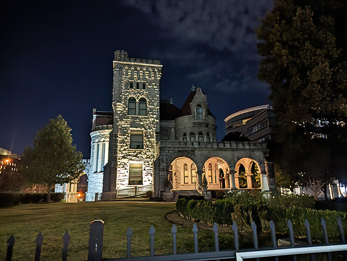 As twilight falls, Rhodes Hall transforms into a magical beacon. The illuminated arches and tower create a fairytale silhouette against Atlanta's night sky.