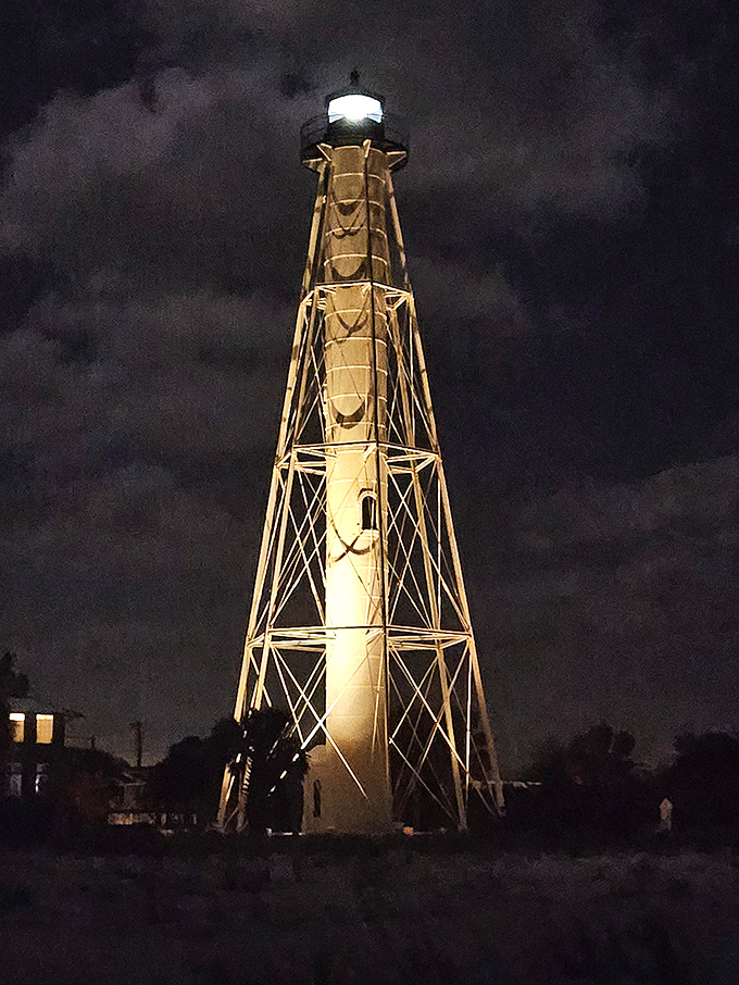 After dark, the lighthouse transforms into a glowing beacon against the night sky, like Florida's own version of the Eiffel Tower.
