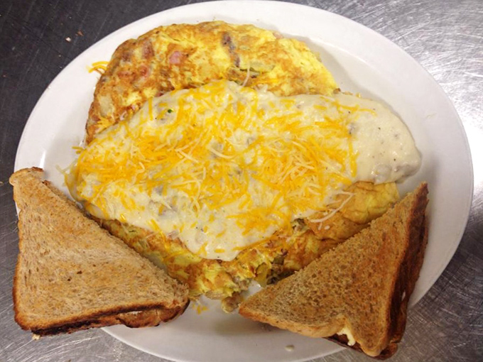 Behold the star attraction: a cheese-blanketed omelet that makes you question why you'd ever order anything else. Breakfast nirvana achieved.