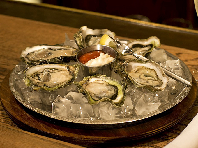 Behold perfection on the half shell - these glistening oysters will haunt your taste buds forever.