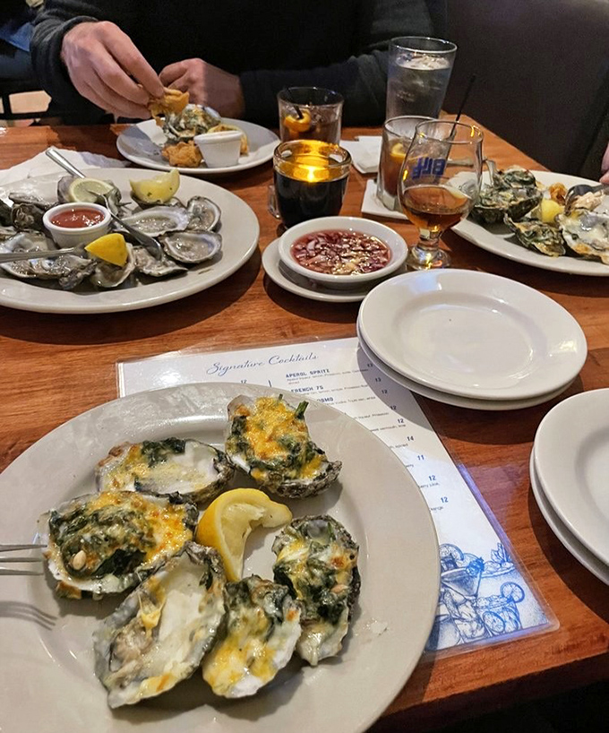 Oysters that make you question every life decision that didn't involve eating these sooner. Some baked with spinach, others awaiting just a squeeze of lemon.