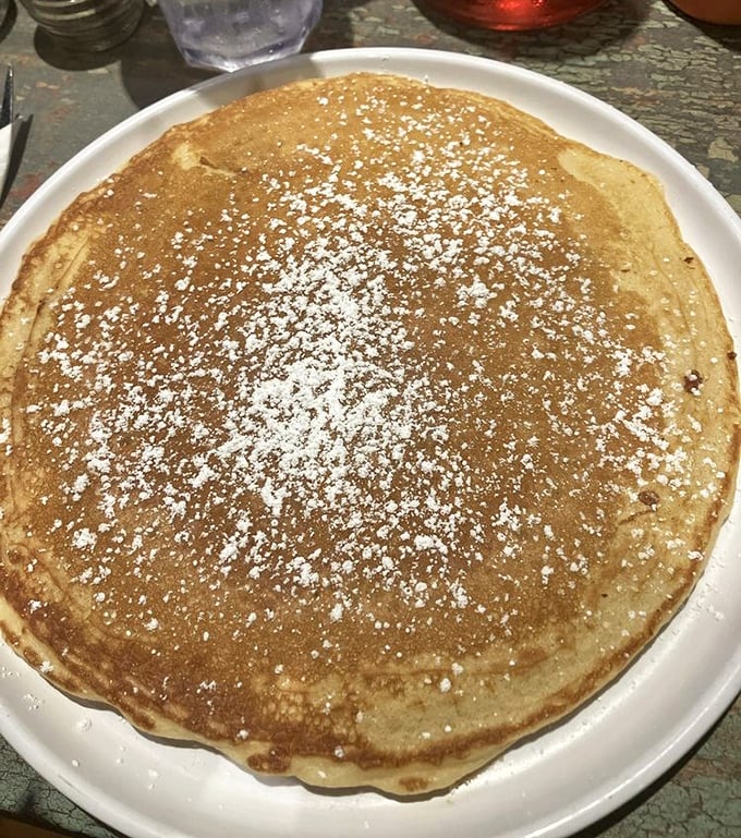 Behold the pancake of your dreams&mdash;golden, dusted with powdered sugar, and waiting patiently for its maple syrup baptism.