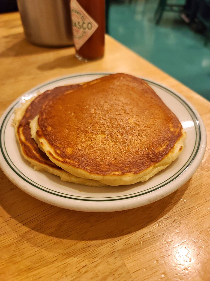 Golden-brown perfection that makes other pancakes look like sad, flat frisbees. These fluffy discs of joy are what breakfast dreams are made of.