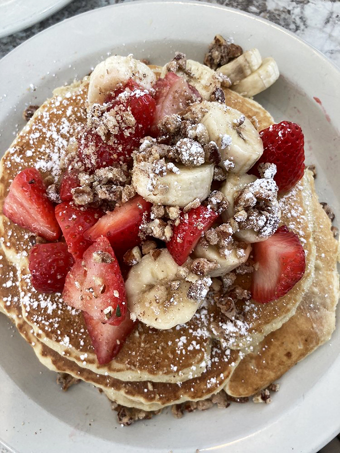 Pancake perfection topped with fresh fruit and a dusting of powdered sugar. Breakfast doesn't get more photogenic&mdash;or more heavenly&mdash;than this.