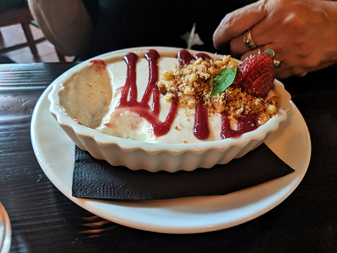 Not your grandmother's panna cotta (unless your nonna was a culinary genius). This silky creation with berry sauce and crumble topping performs a delicate ballet of textures.
