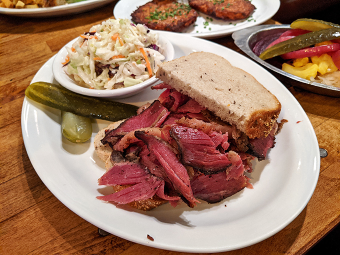 Pastrami so tender it practically surrenders to your fork. Served with coleslaw, pickles, and enough meat to feed a small kibbutz.