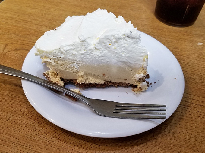 The star of the show: a slice of peanut butter pie that makes grown adults contemplate ordering a second piece before finishing the first.