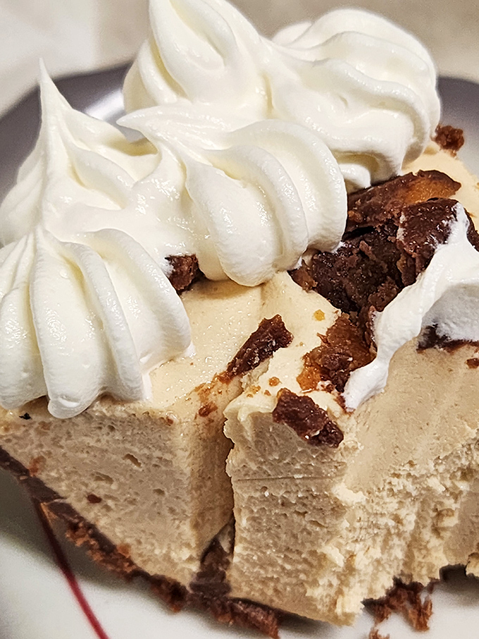 The legendary peanut butter pie in all its glory. That perfect balance of creamy and sweet might just make you forget your table manners.