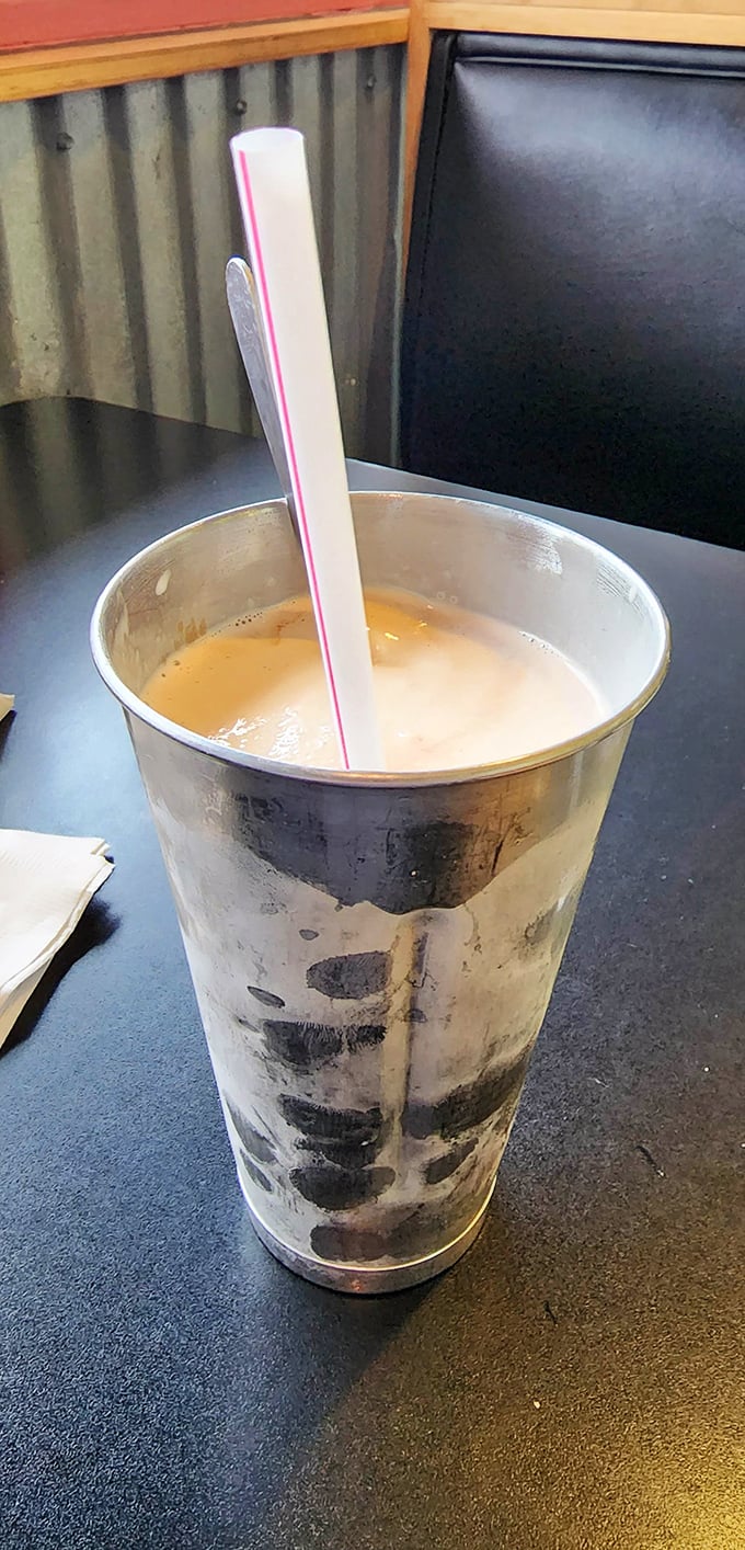 Behold the peanut butter milkshake that could make Elvis weep with joy - thick, creamy, and absolutely divine.