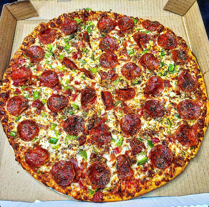 Pizza perfection exists, and here's the photographic evidence. Those cup-and-char pepperoni create little pools of flavor that should be declared national treasures.