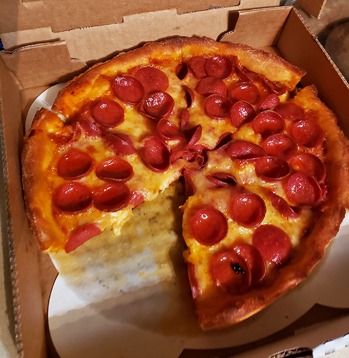 The star of the show: pepperoni cups that curl into perfect little pools of savory goodness, making other pizzas seem like opening acts.