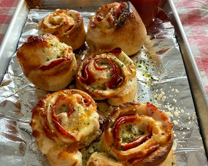 These pepperoni rolls aren't just appetizers; they're little spirals of joy that make waiting for your pizza an event rather than a chore.