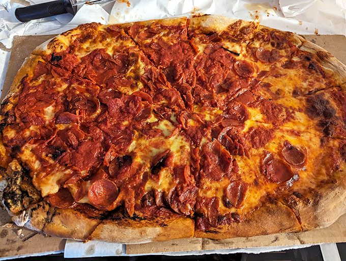 This isn't pizza&mdash;it's a pepperoni playground where each crispy cup holds a tiny pool of flavor. Diet plans come here to die gloriously.