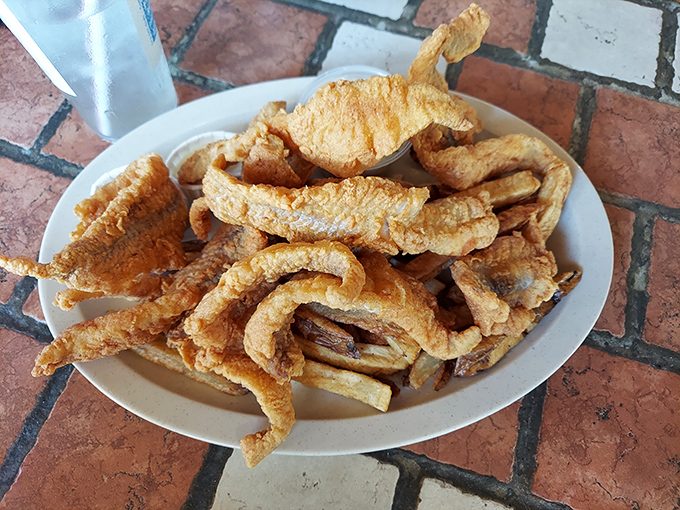 Golden-fried perch that would make Lake Erie proud, served with a mountain of those legendary fries &ndash; a plate that demands both your attention and your appetite.