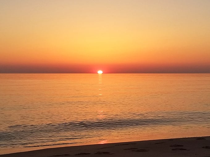 That magical moment when Lake Michigan swallows the sun, painting the sky in hues that would make Monet drop his brushes in awe.