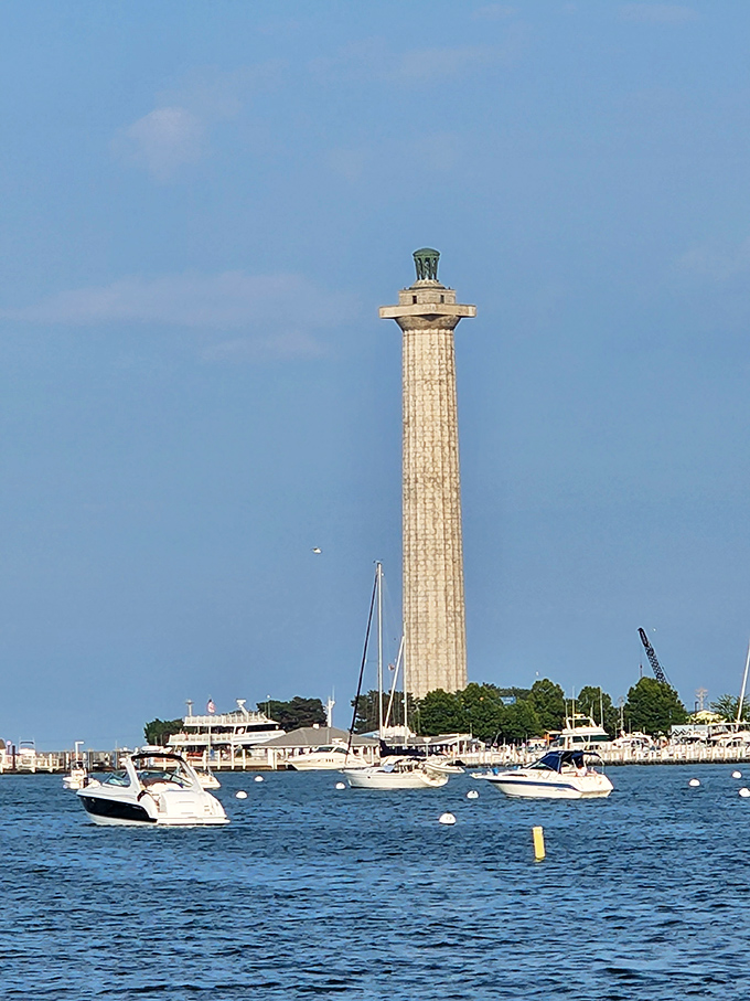 Perry's Victory Monument stands tall like a limestone exclamation point, declaring "This view is worth the ferry ride!" across Put-in-Bay's sparkling harbor.