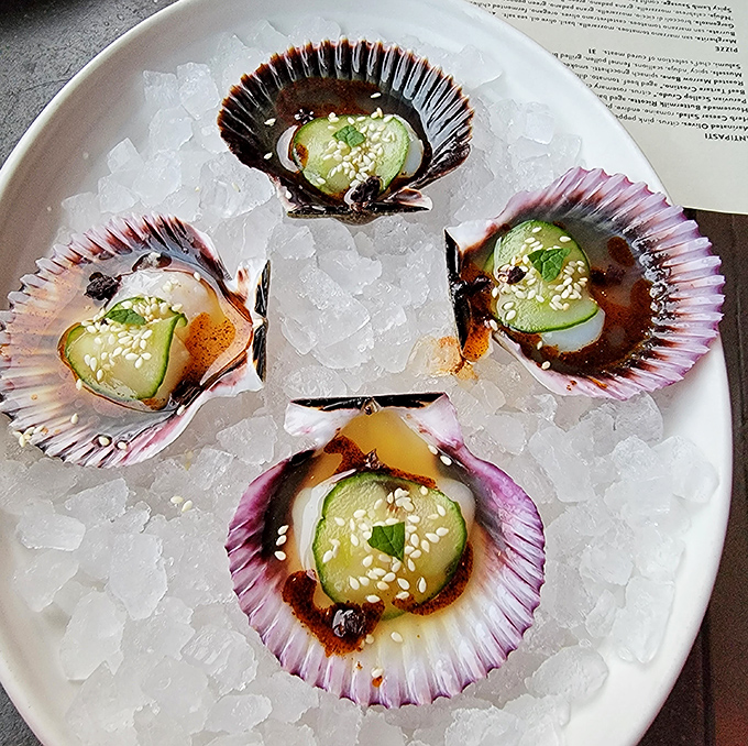 Peruvian scallops nestled in their shells like oceanic jewels&mdash;a perfect symphony of sweet flesh, bright citrus, and cucumber crunch.