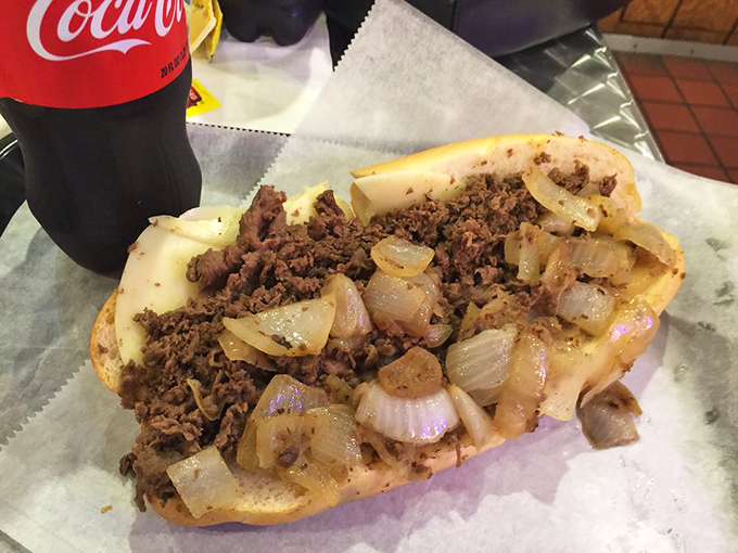 Behold the star of the show: thinly sliced ribeye and caramelized onions nestled in an Amoroso roll&mdash;Philadelphia's most perfect union since Ben met Franklin.